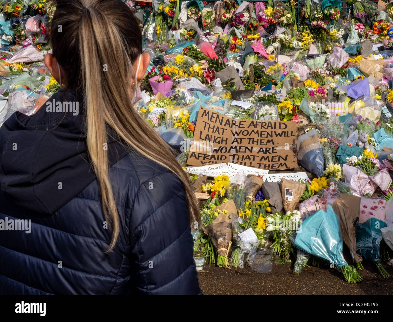 A visitor to the makeshift shrine to the murdered woman Sarah Everard ...