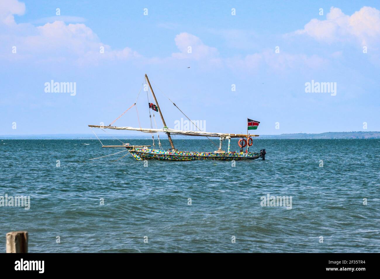 A view of the FlipFlopi boat anchored at a beach in Rusinga Island ...