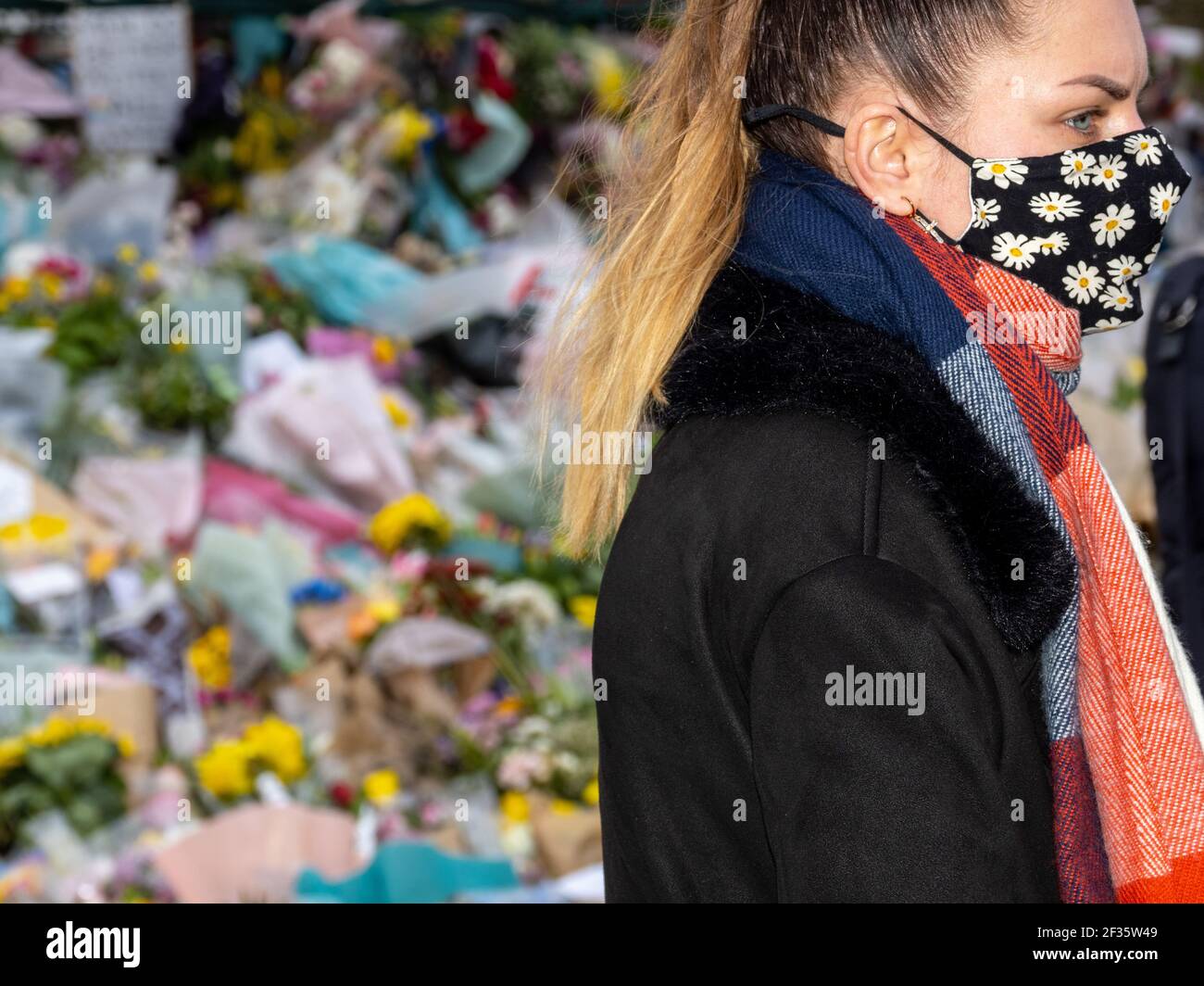 A visitor to the makeshift shrine to the murdered woman Sarah Everard ...