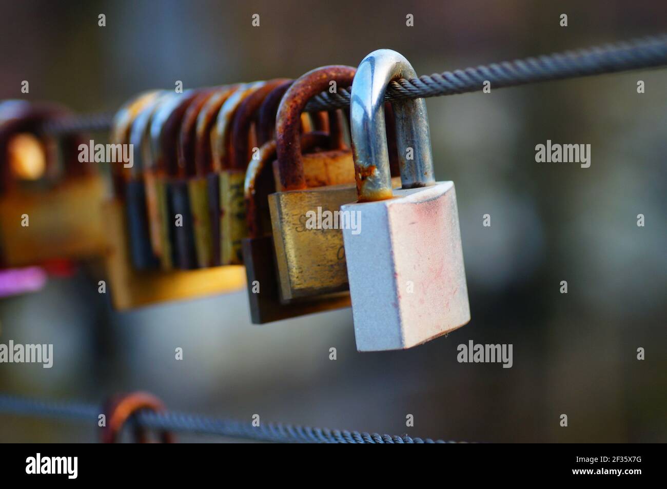 A closeup shot of Love locks on a bridge in Marburg, Germany Stock ...