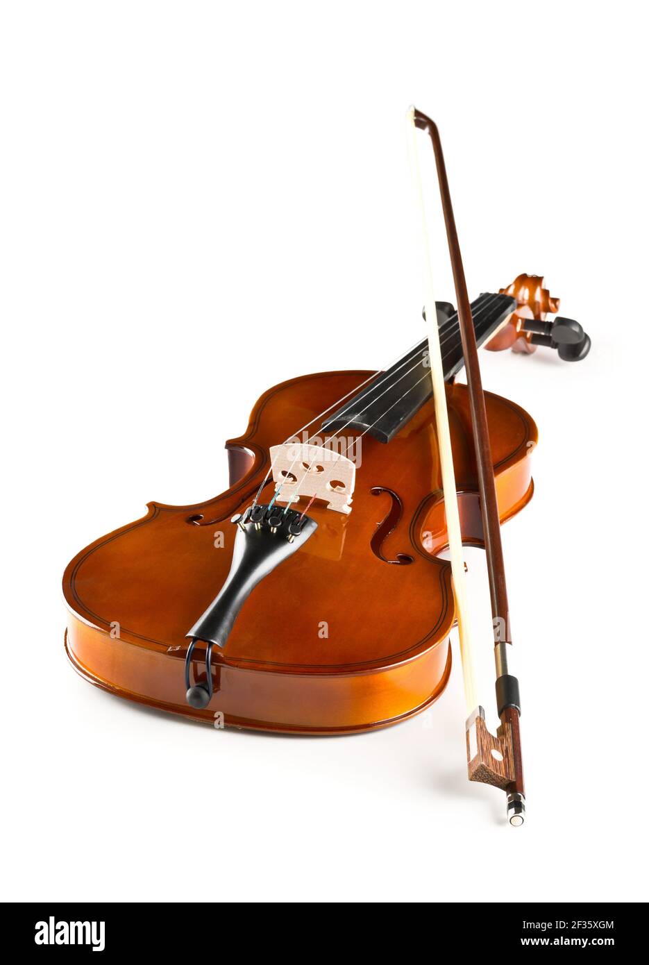 Brown wooden fiddle or violin, classic musical instrument, with bow ...
