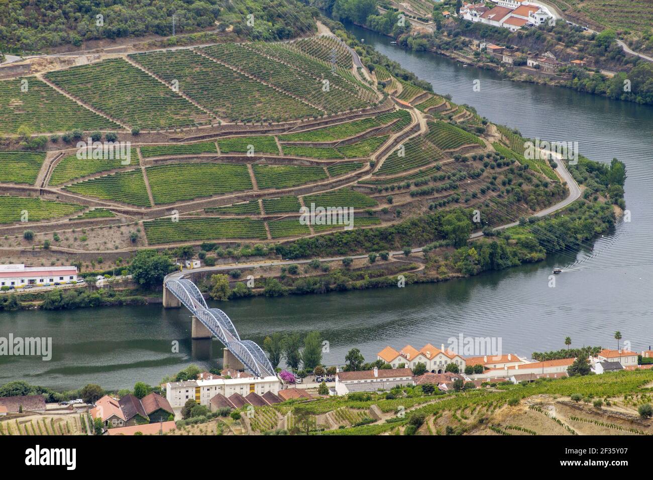 The landscape view of the river passes through the fields, rural ...