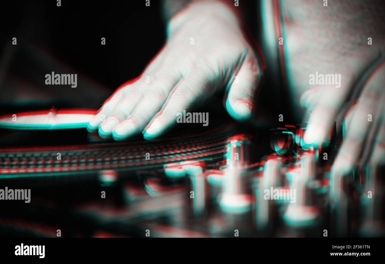 Party dj scratches vinyl records with hip hop music on vintage turn ...