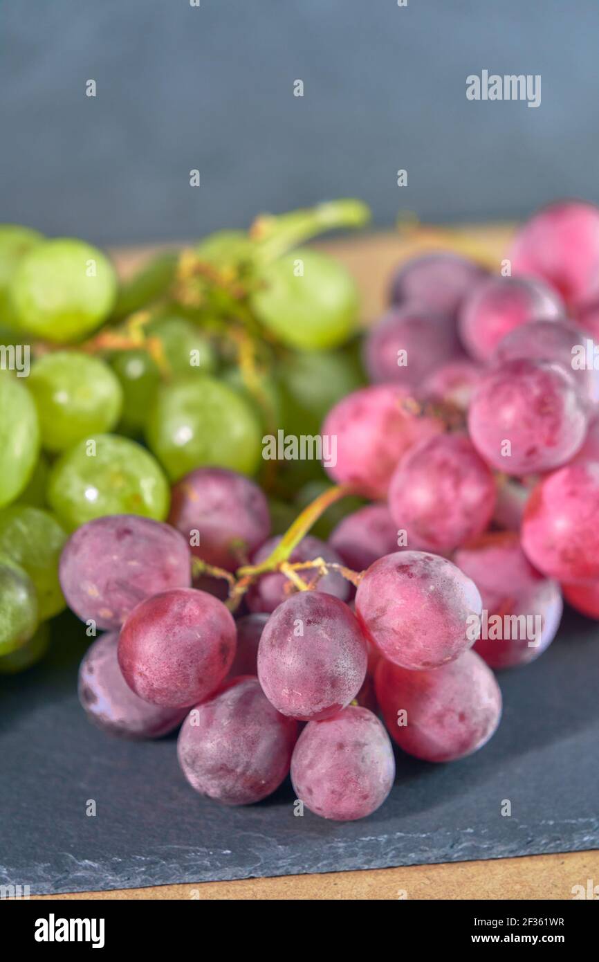 Red grapes on dark hi-res stock photography and images - Alamy