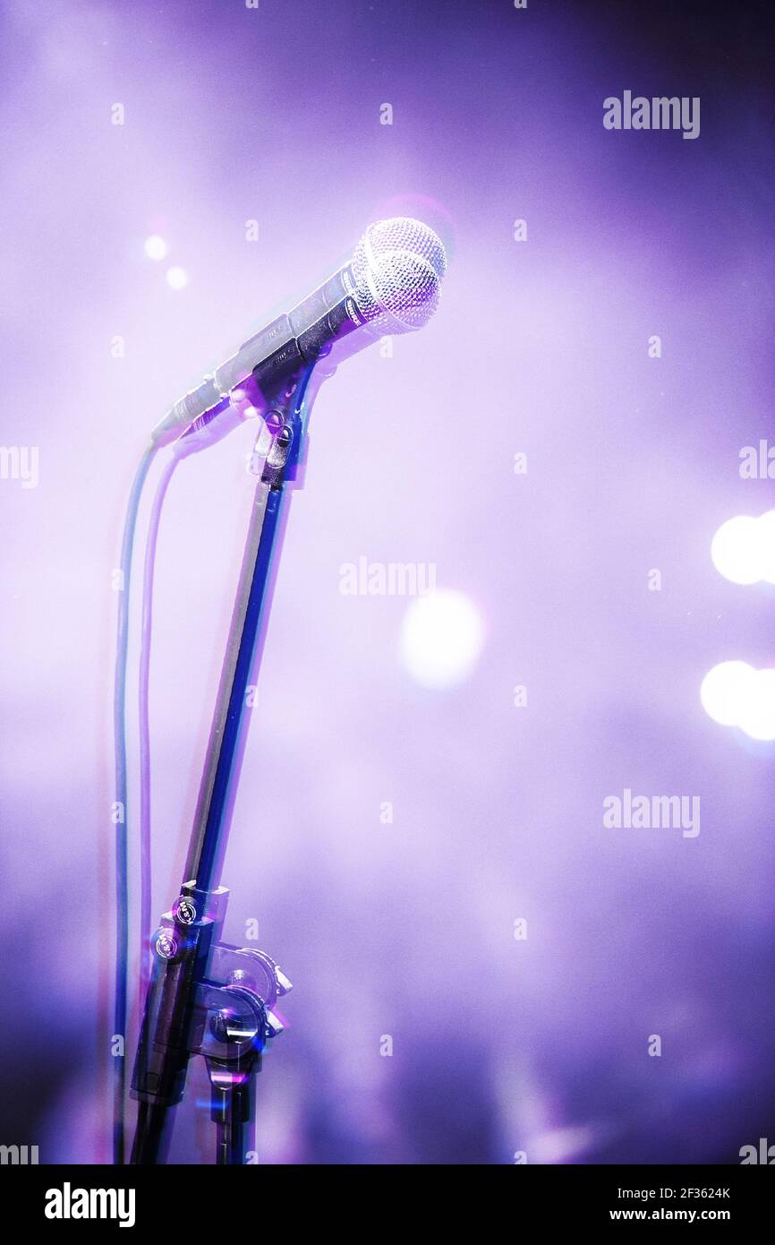 Professional vocal microphone on stand at rap concert.Illustration of ...