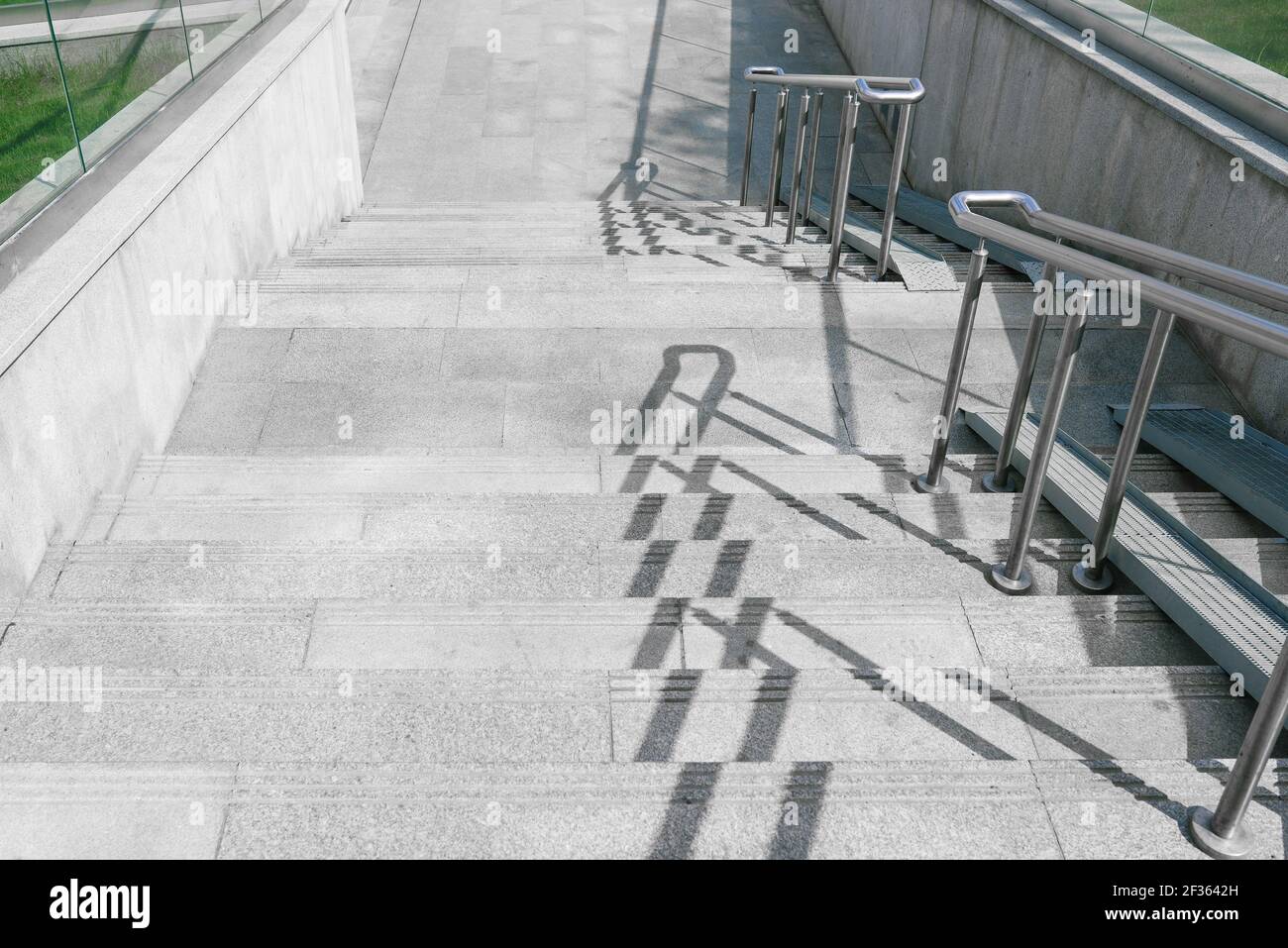 Concrete gray staircase with handicapped ramp. Urban architecture. Exit ...