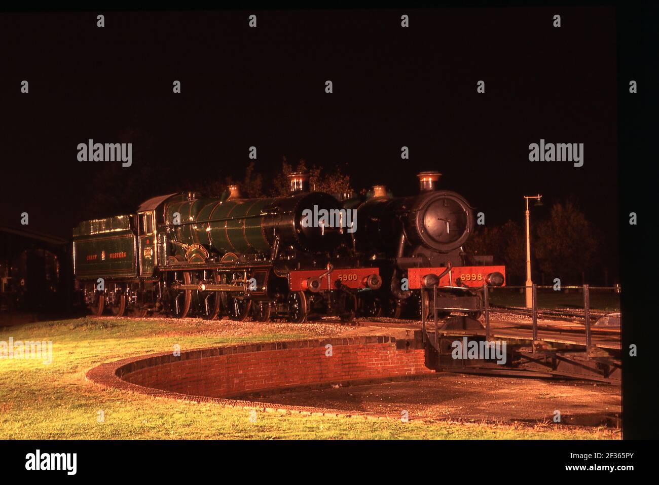 Steam engines at night Stock Photo - Alamy
