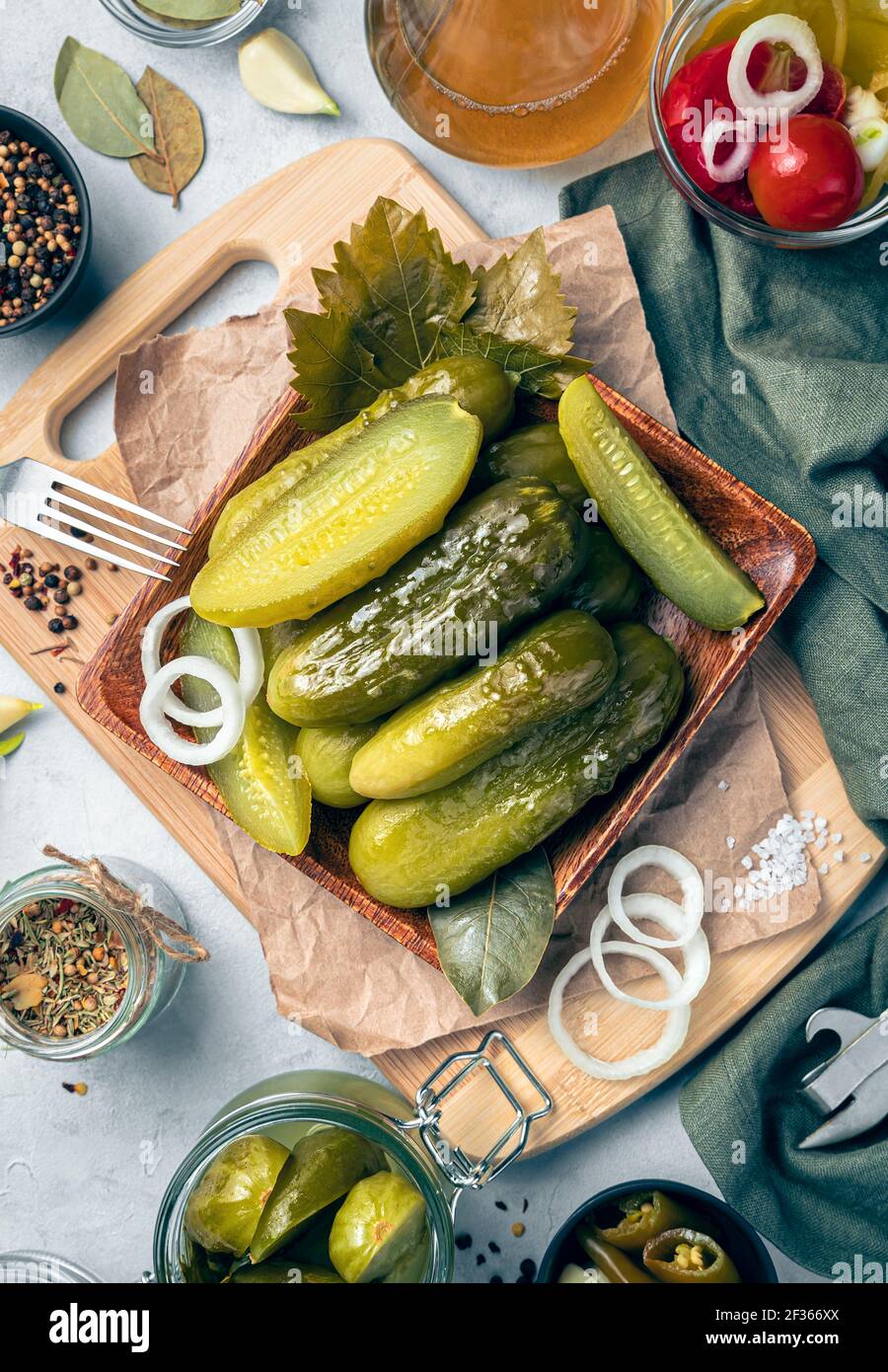 Homemade pickles and ingredients on a gray background. Top view ...