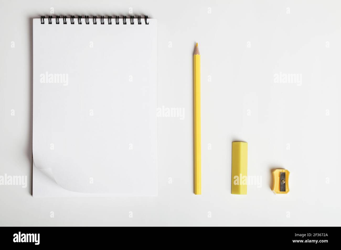 office table desk, workspace with notebook, yellow pencil, erasing and ...
