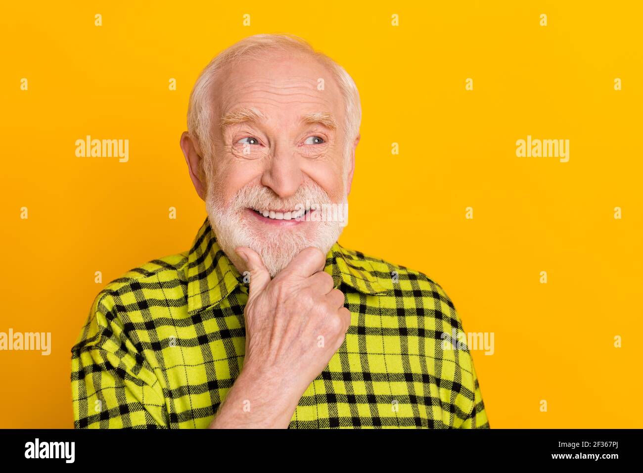 Photo of cheerful old man happy positive smile hand touch chin think ...