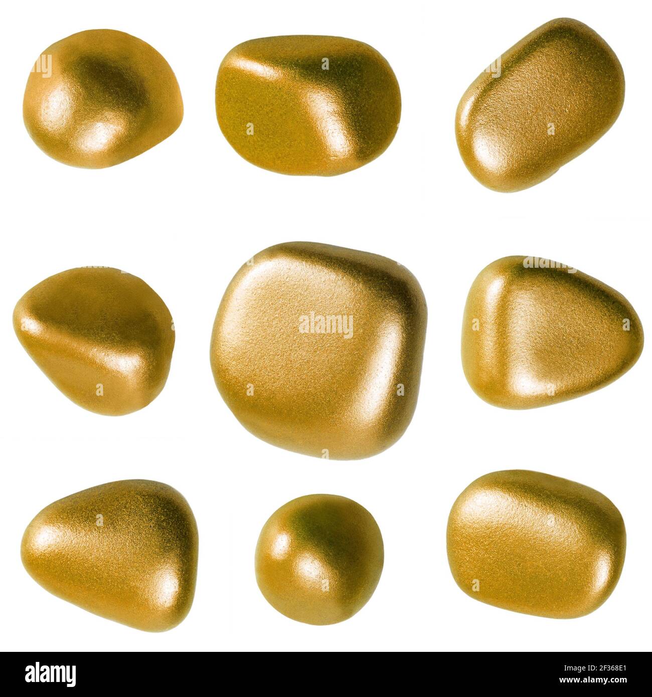 Golden set pebble balancing stones. Stones collection isolated on white ...