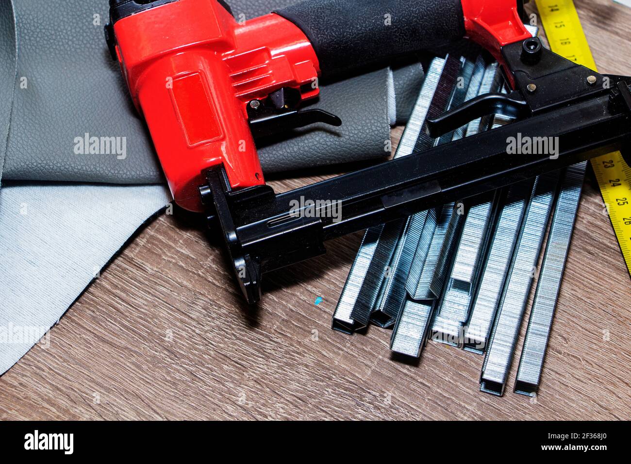 concept of furniture production and repair. Stapler and staples ...