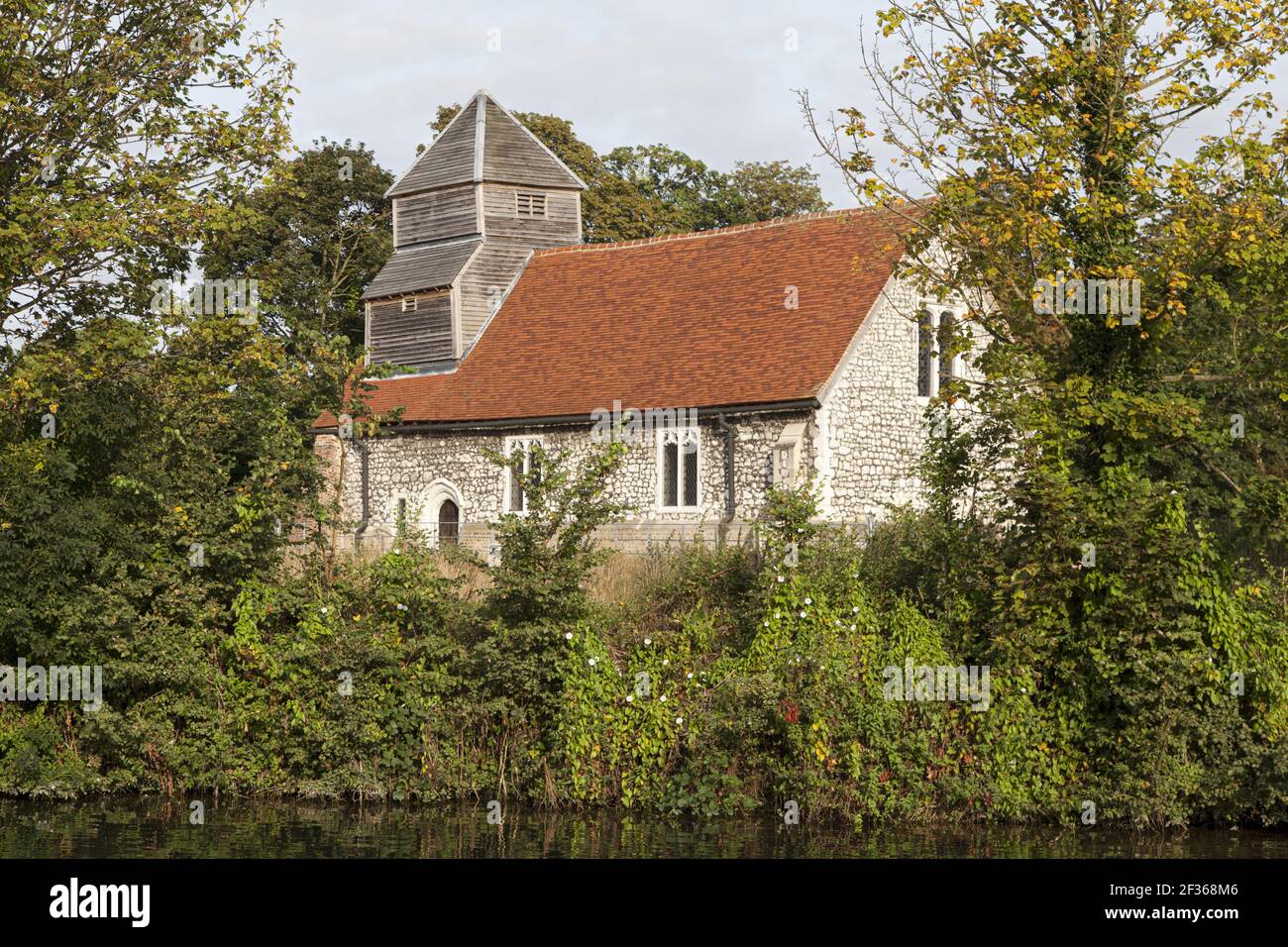 The chalk rubble church of St Mary Magdalene on the banks of the River ...