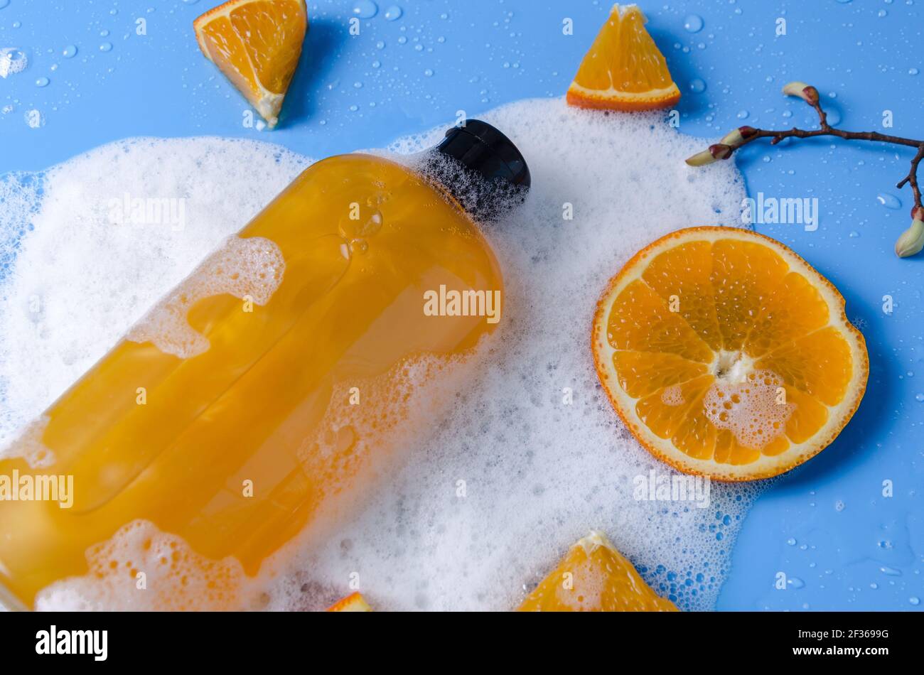Shampoo, gel, liquid soap of orange color from natural ingredients in a ...