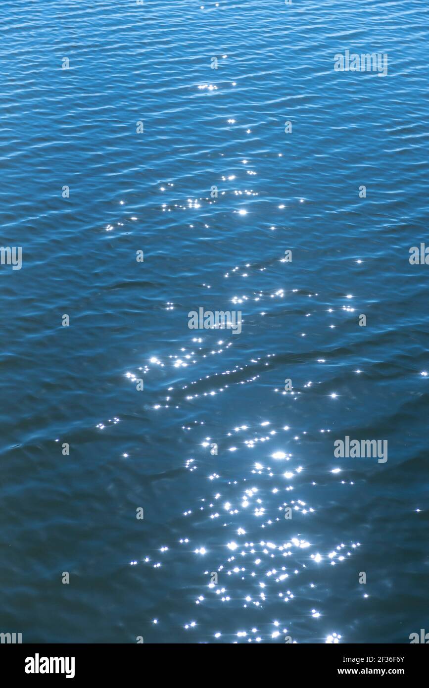 Sun Sparkling on Water Stock Photo - Alamy
