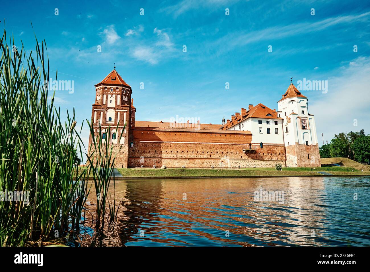 Mir castle complex in summer day with blue cloudy sky. Tourism landmark ...