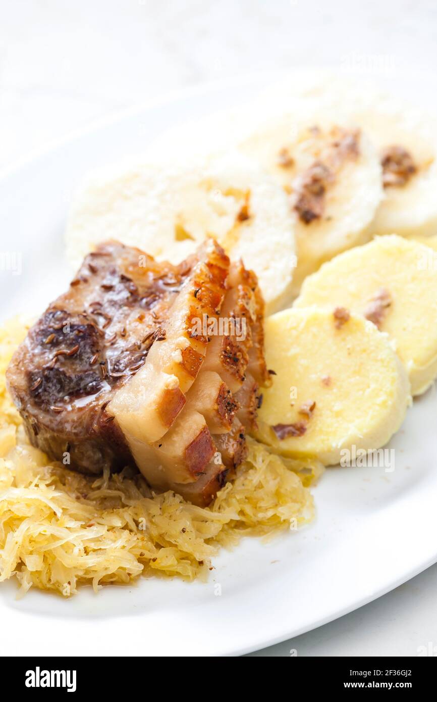 traditional Czech cuisine pork with cabbage and dumplings Stock Photo ...