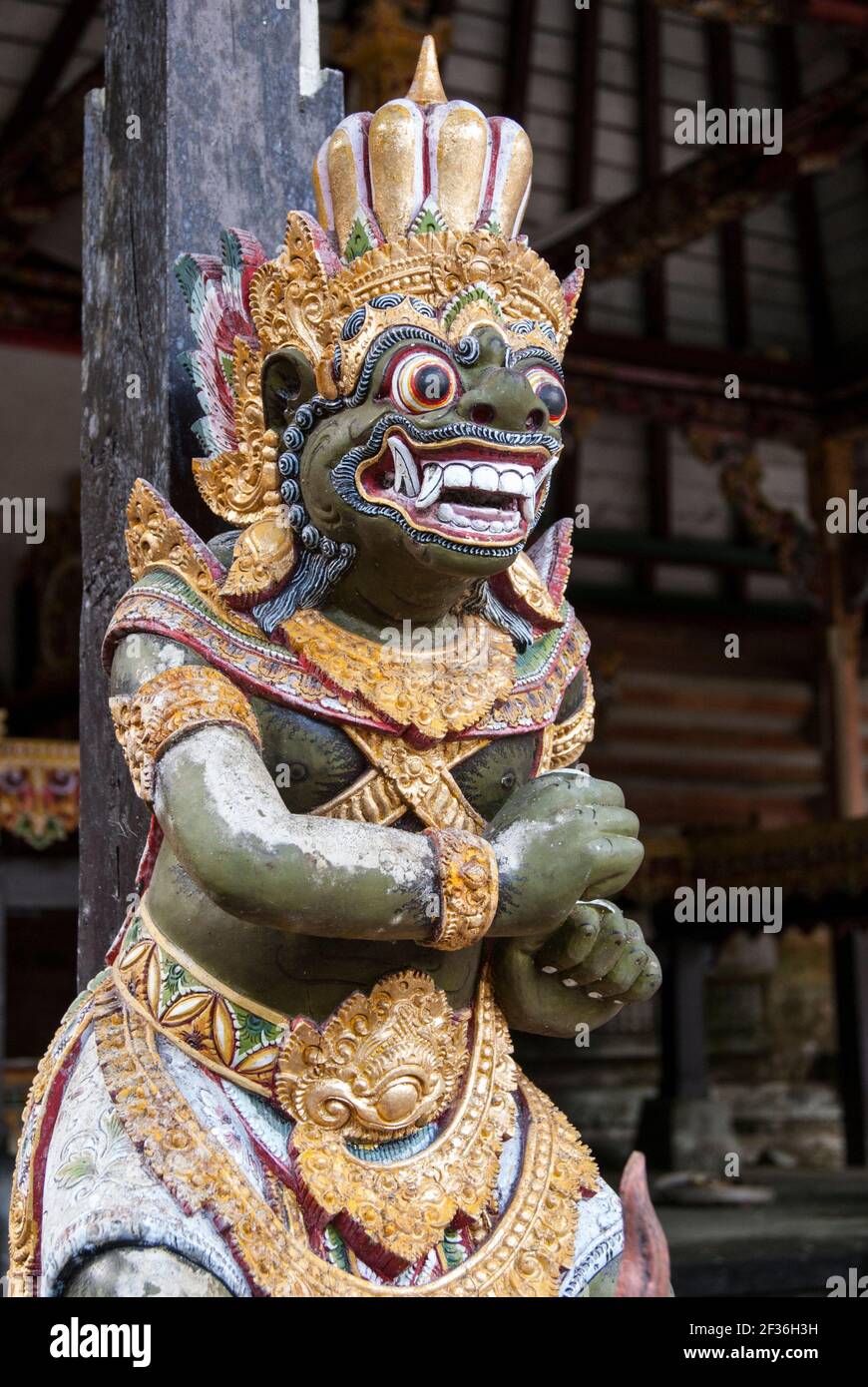 Sculpture in the temple of the sacred spring, painted green and gold ...
