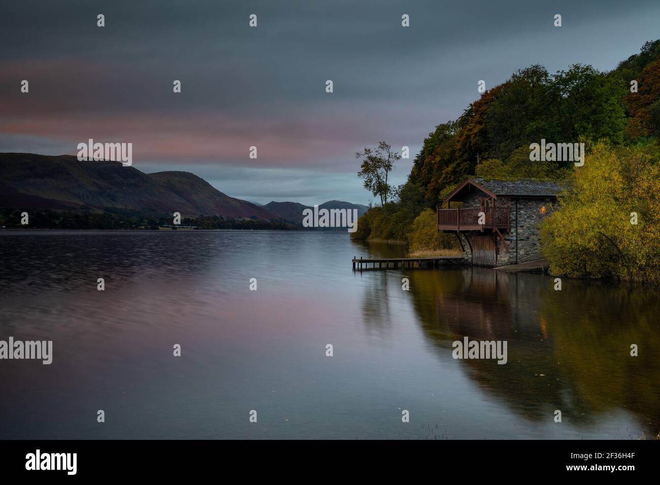 Pooley Bridge Boat House at sunrise on the Ullswater in the Lake ...