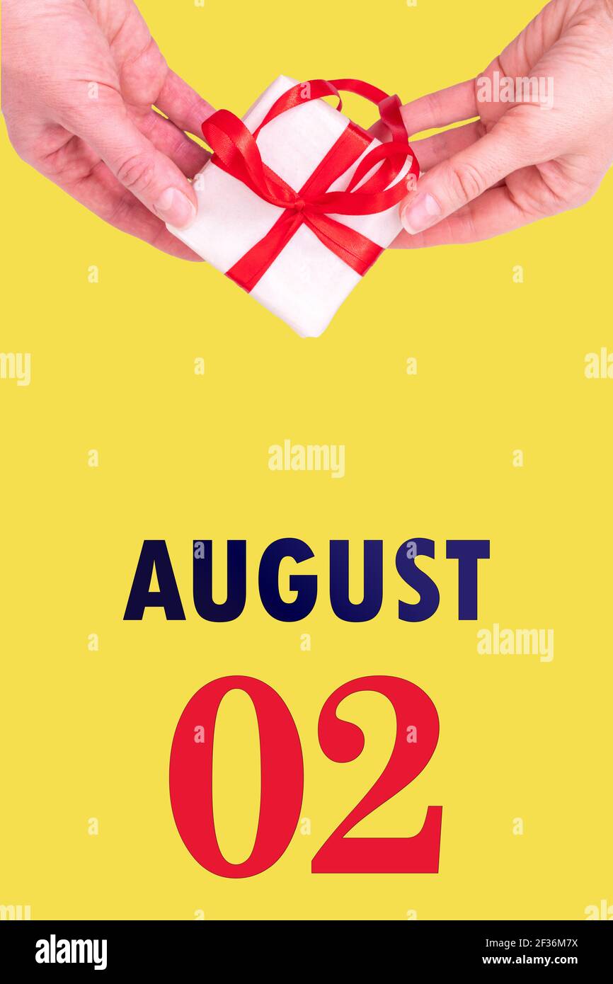 August 2nd. Festive Vertical Calendar With Hands Holding White Gift Box ...