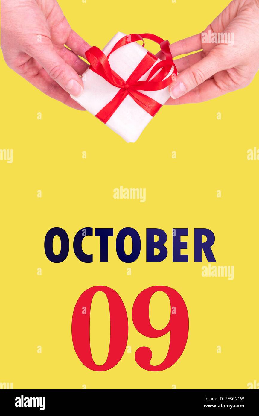 October 9th. Festive Vertical Calendar With Hands Holding White Gift ...
