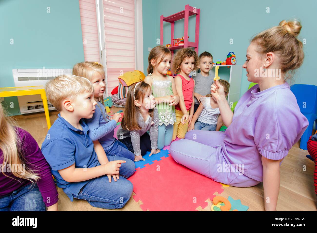Providing new teaching methods with very young learners Stock Photo - Alamy