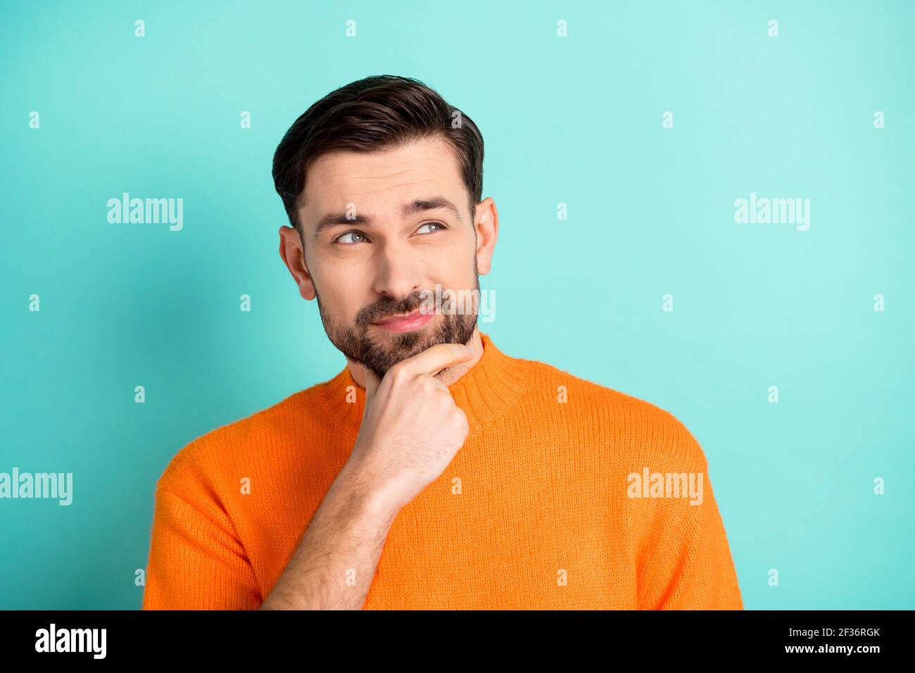 Photo of young handsome guy happy positive smile hand touch chin dream ...