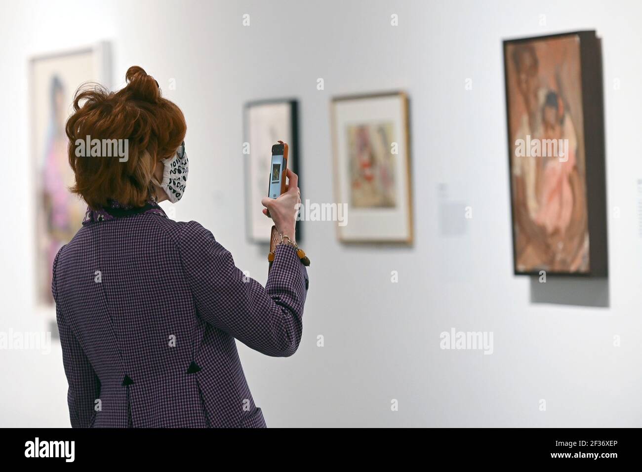 People attend the press preview of artist Alice Neel “People Come First ...