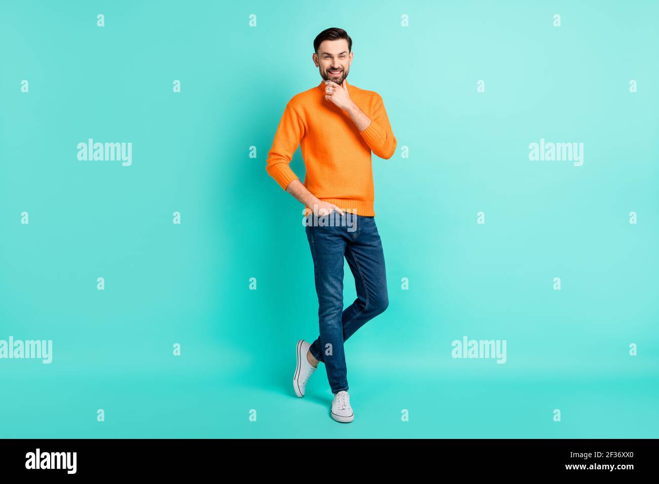 Full size photo of young handsome good looking smiling flirty man hold ...