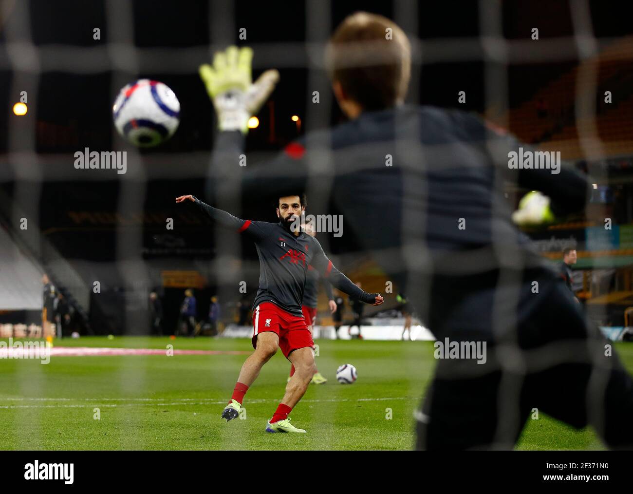 Liverpool's Mohamed Salah warming up before the Premier League match at ...