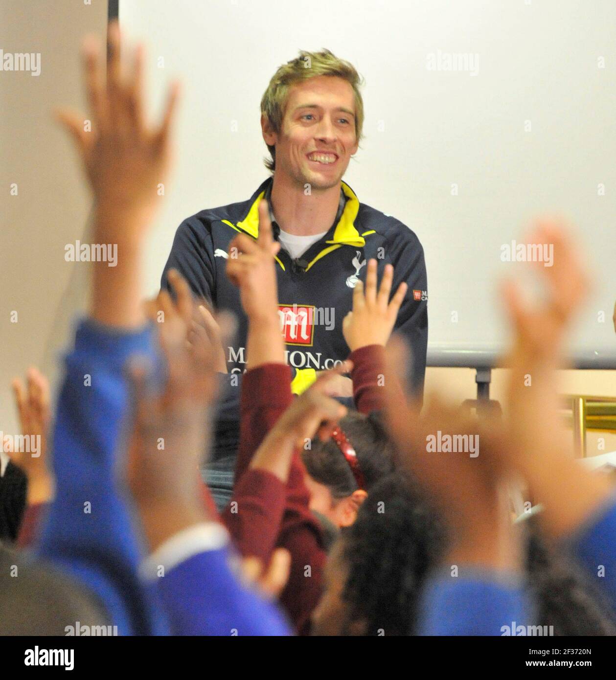 PETER CROUCH SPURS AND ENGLAND STRIKER. reading books with school ...
