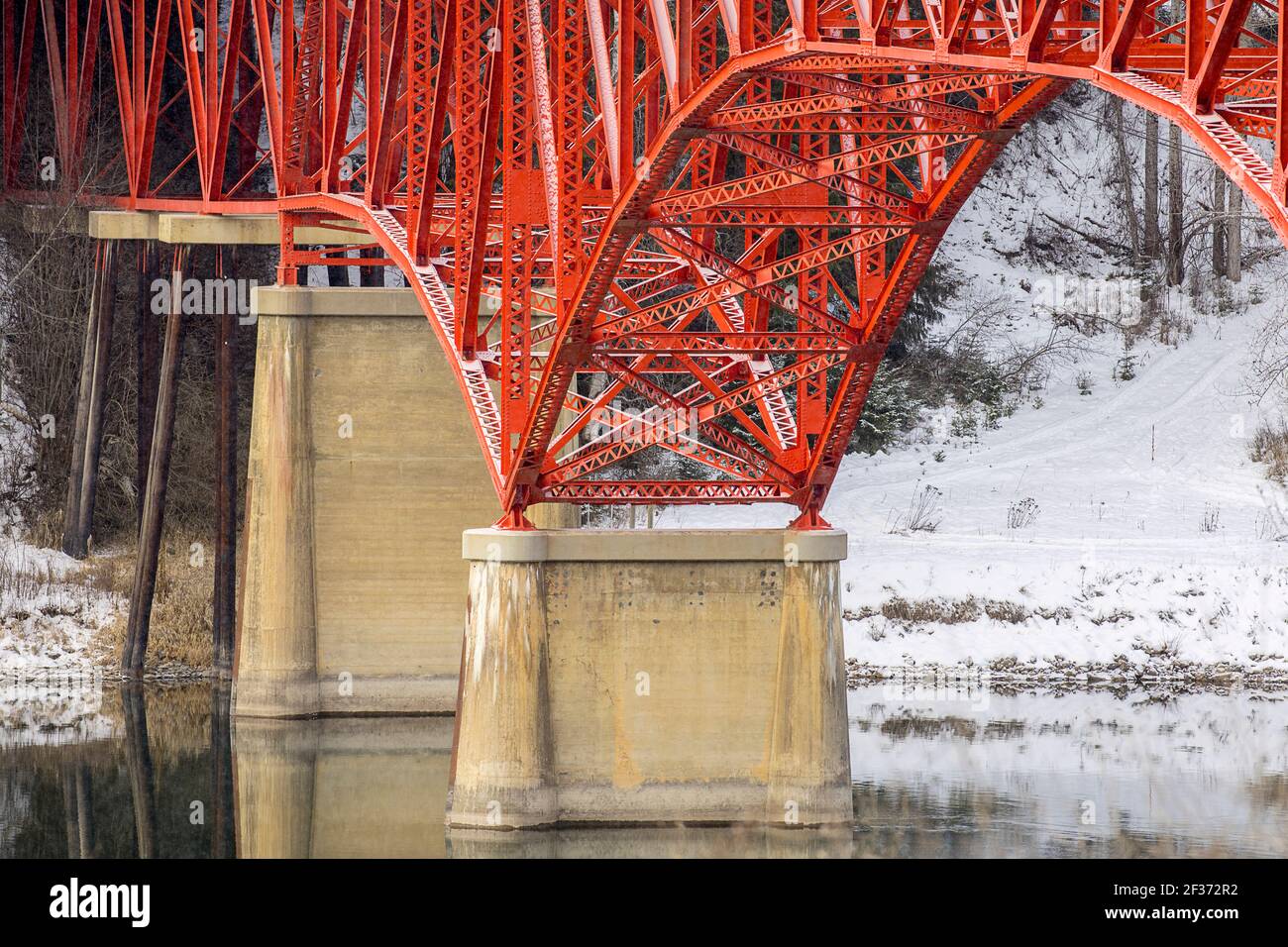A close up of the support structure of a red bridge in Ione, Washington ...