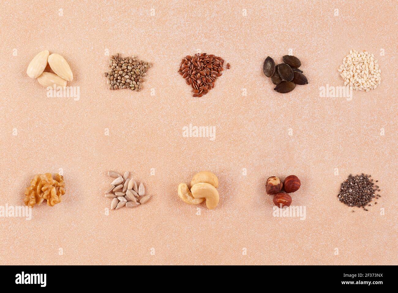 Various seeds and nuts on table. Flax, hemp, sunflower, sesame, chia ...