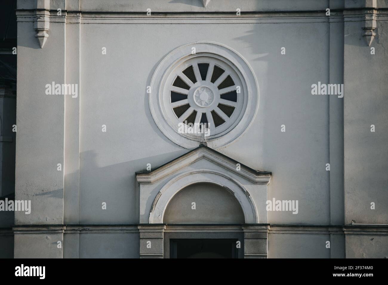 A rose window on a gothic style church wall Stock Photo - Alamy