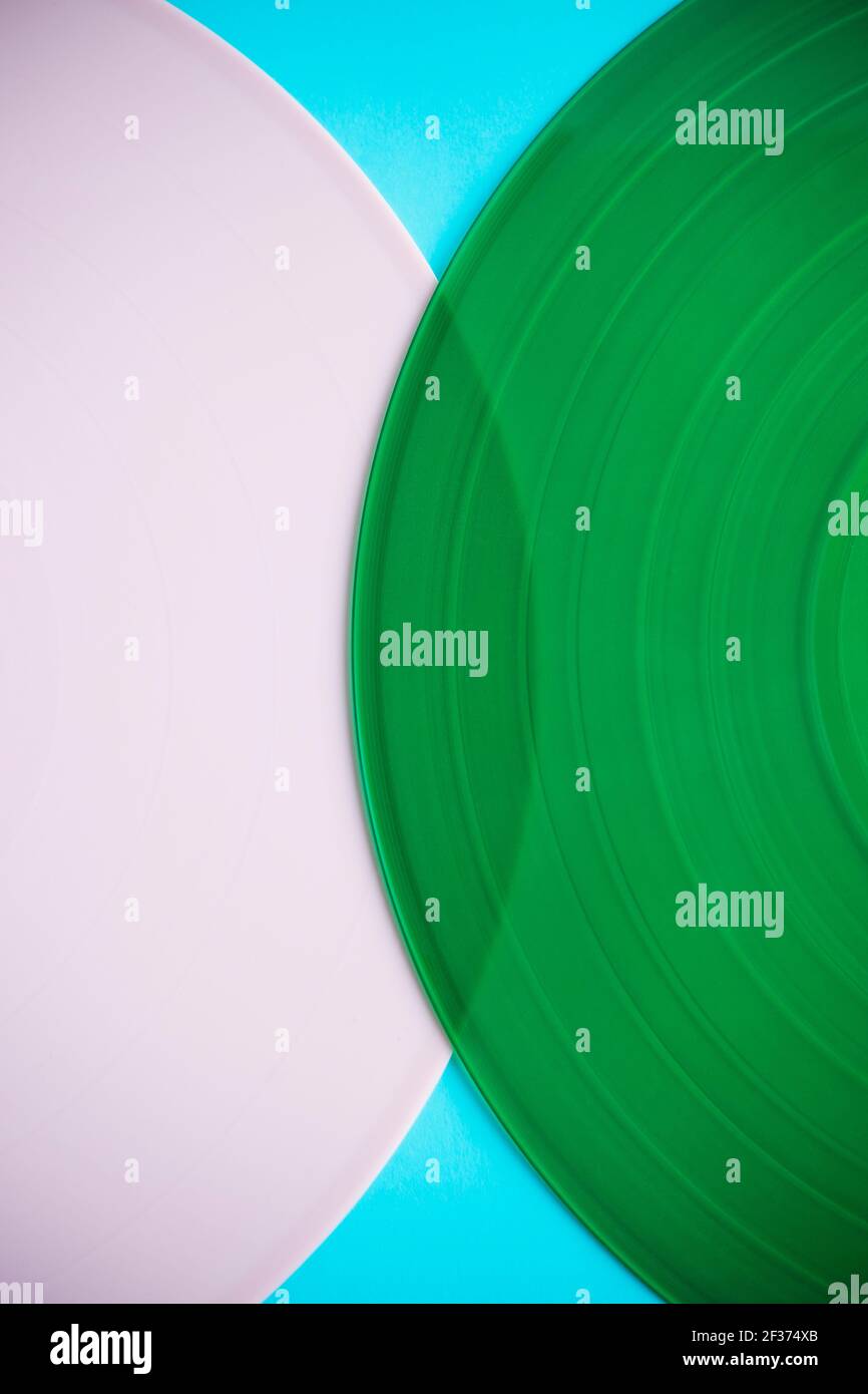 Detail of two different coloured vinyl records Stock Photo - Alamy