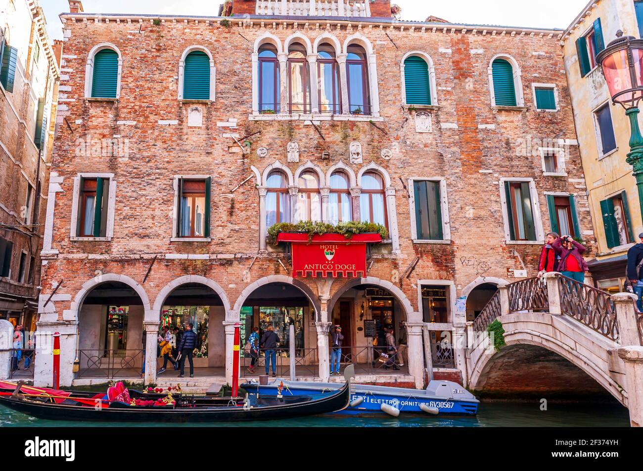 Colorful medieval facade and gondolas in Venice in Veneto, Italy Stock ...