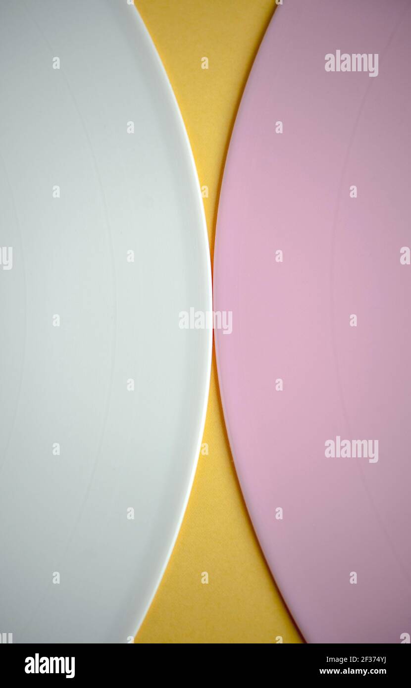 Detail of two different coloured vinyl records Stock Photo - Alamy