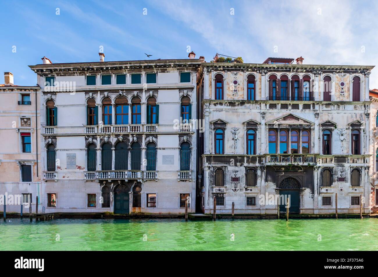 Medieval facades and gondolas on the Grand Canal in Venice in Veneto ...