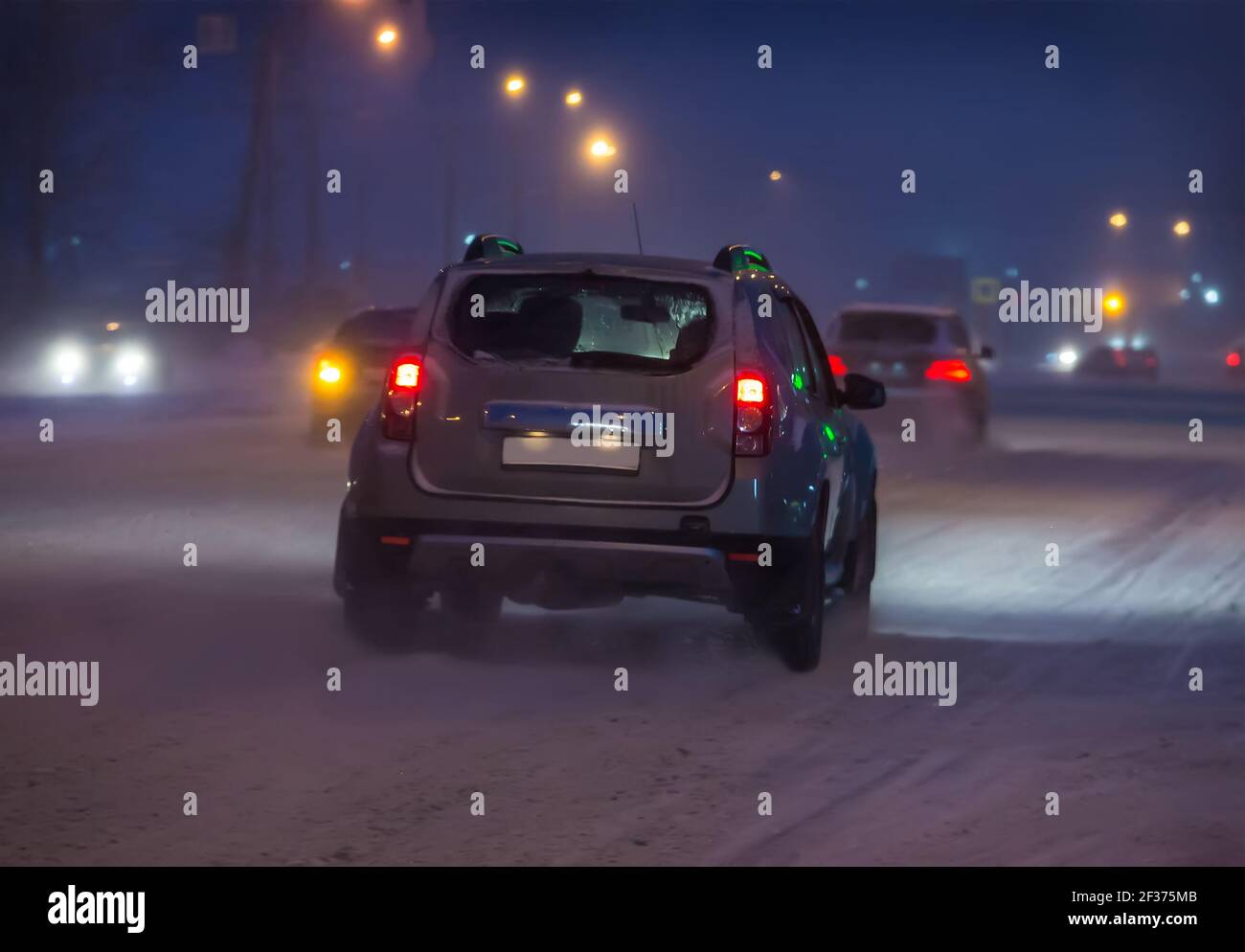 Snowy night drive hi-res stock photography and images - Alamy
