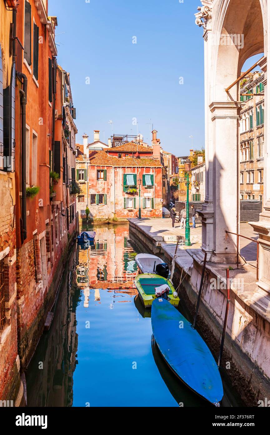 Colorful medieval facade and gondola in Venice in Veneto, Italy Stock ...