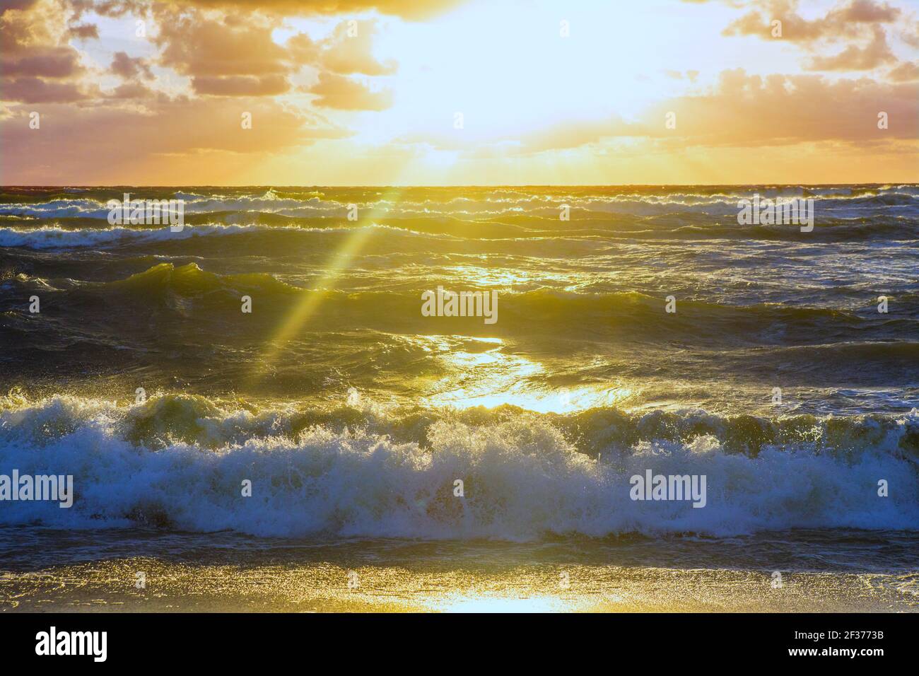 Storm on the Sea during sunset landscape Stock Photo - Alamy