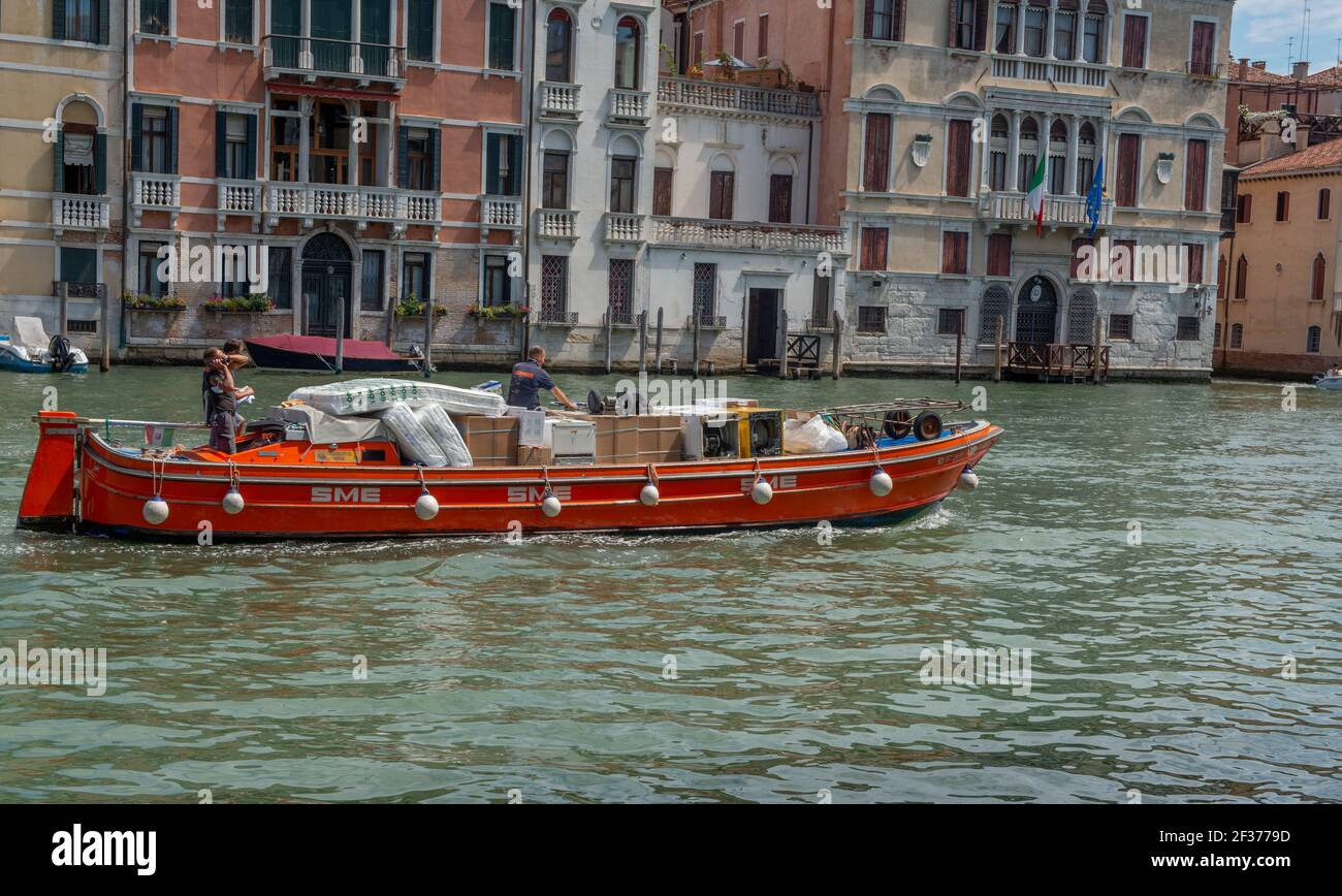 venice italy 18 july 2020: Freight transport by boat in the grand canal ...