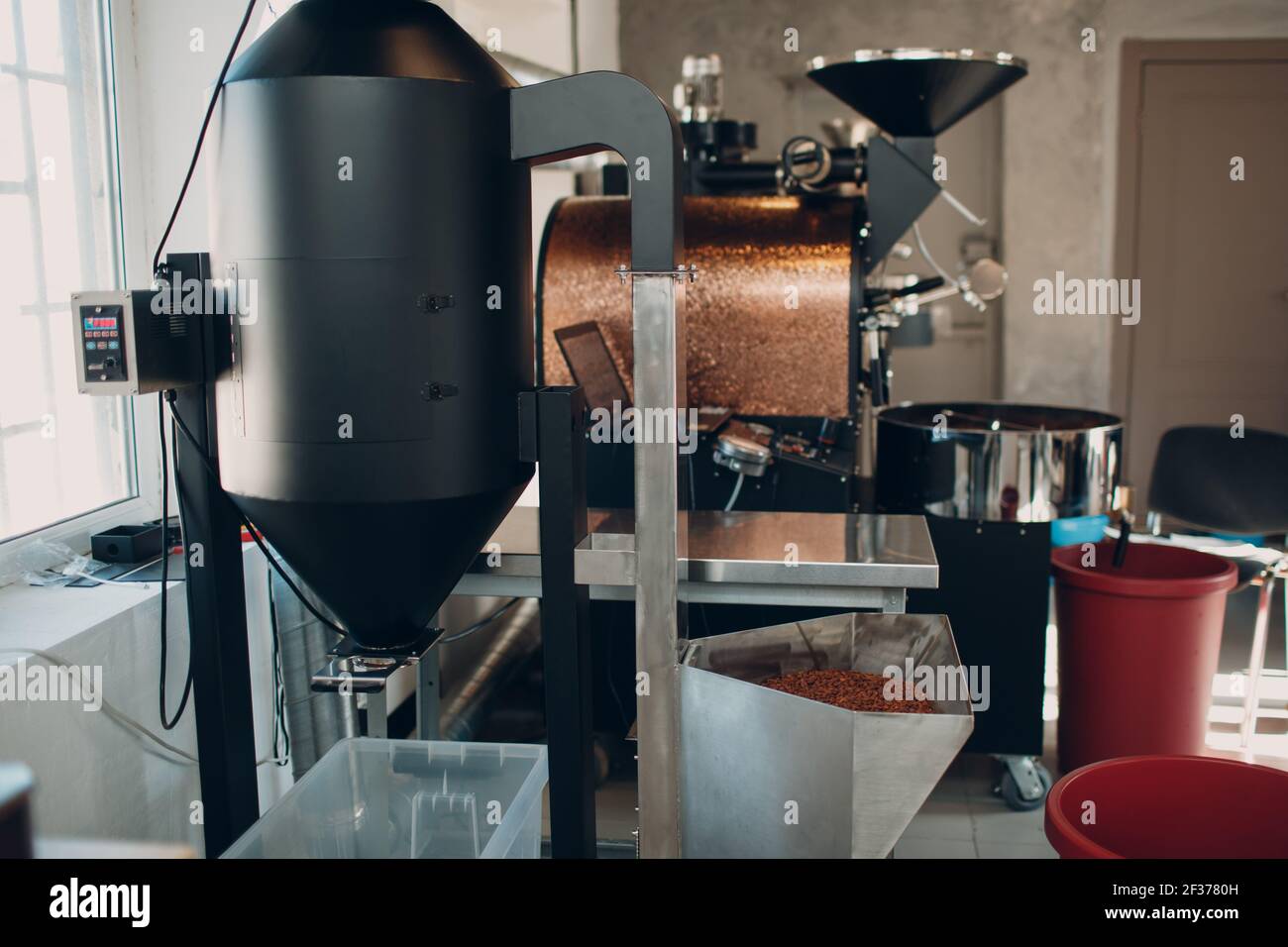 Coffee destoner machine at coffee roasting process Stock Photo - Alamy