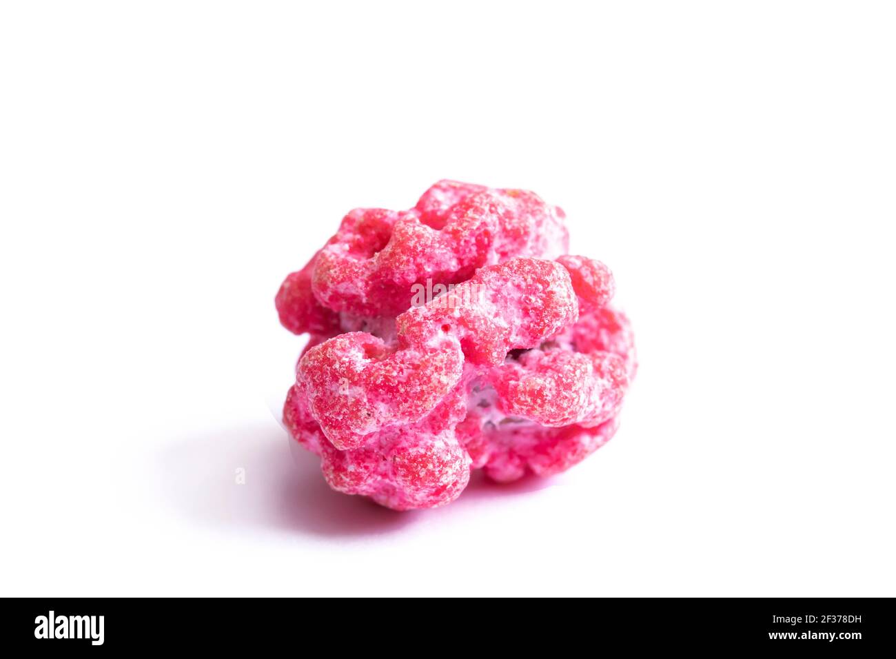 Walnut in pink glaze isolated on white background close up Stock Photo ...