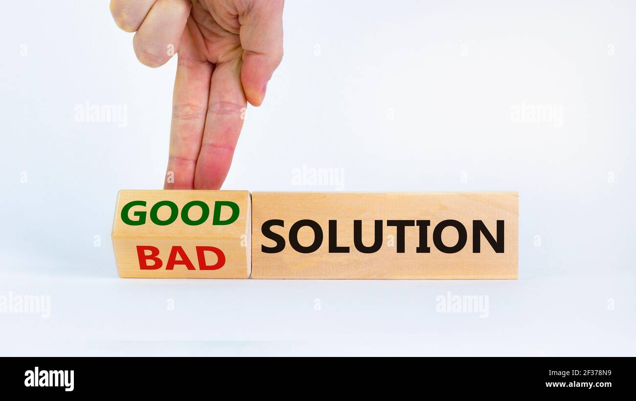 Good or bad solution concept. Businessman turns a block and changes ...
