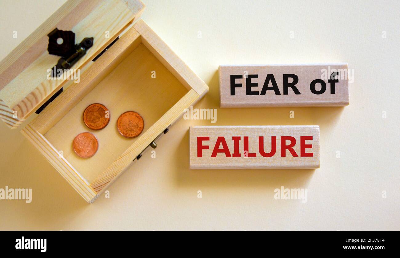 Fear of failure symbol. Wooden blocks with words 'fear of failure ...