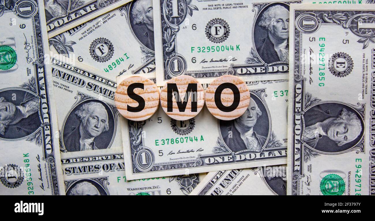 SMO, social media optimization symbol. Wooden circles, word 'SMO ...