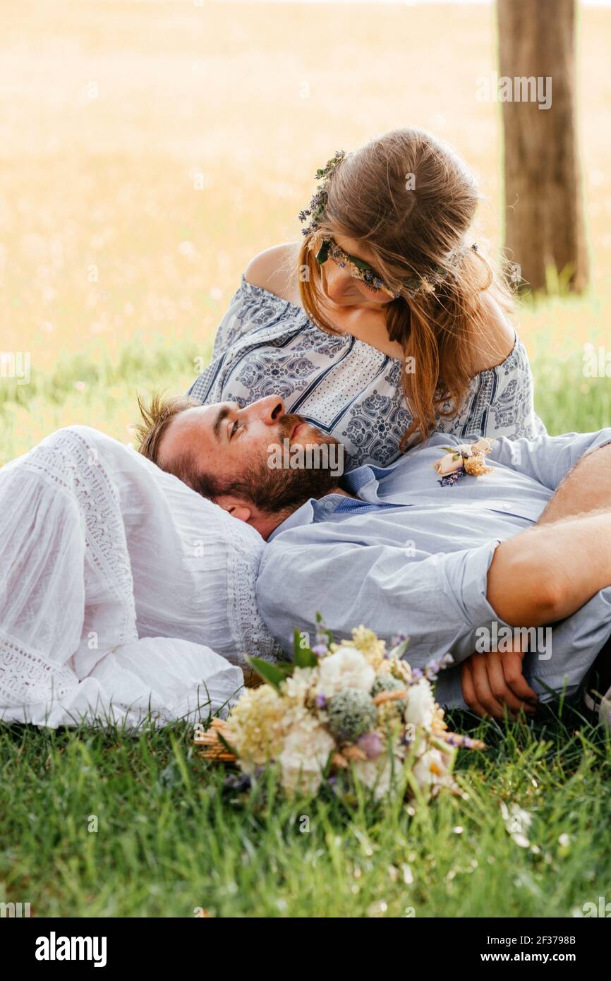 Eclectic rustic wedding couple. Intimate ceremony at backyard Stock ...