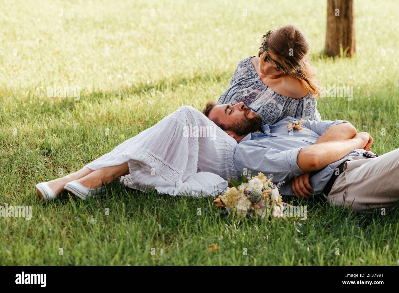 Eclectic rustic wedding couple. Intimate ceremony at backyard Stock ...