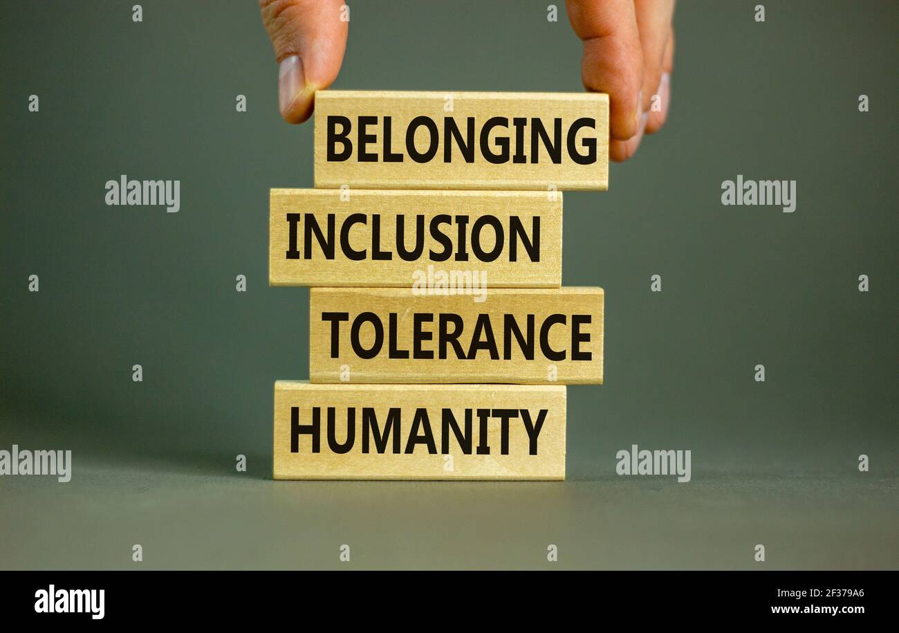 Humanity, tolerance, inclusion, belonging symbol. Wooden blocks with ...